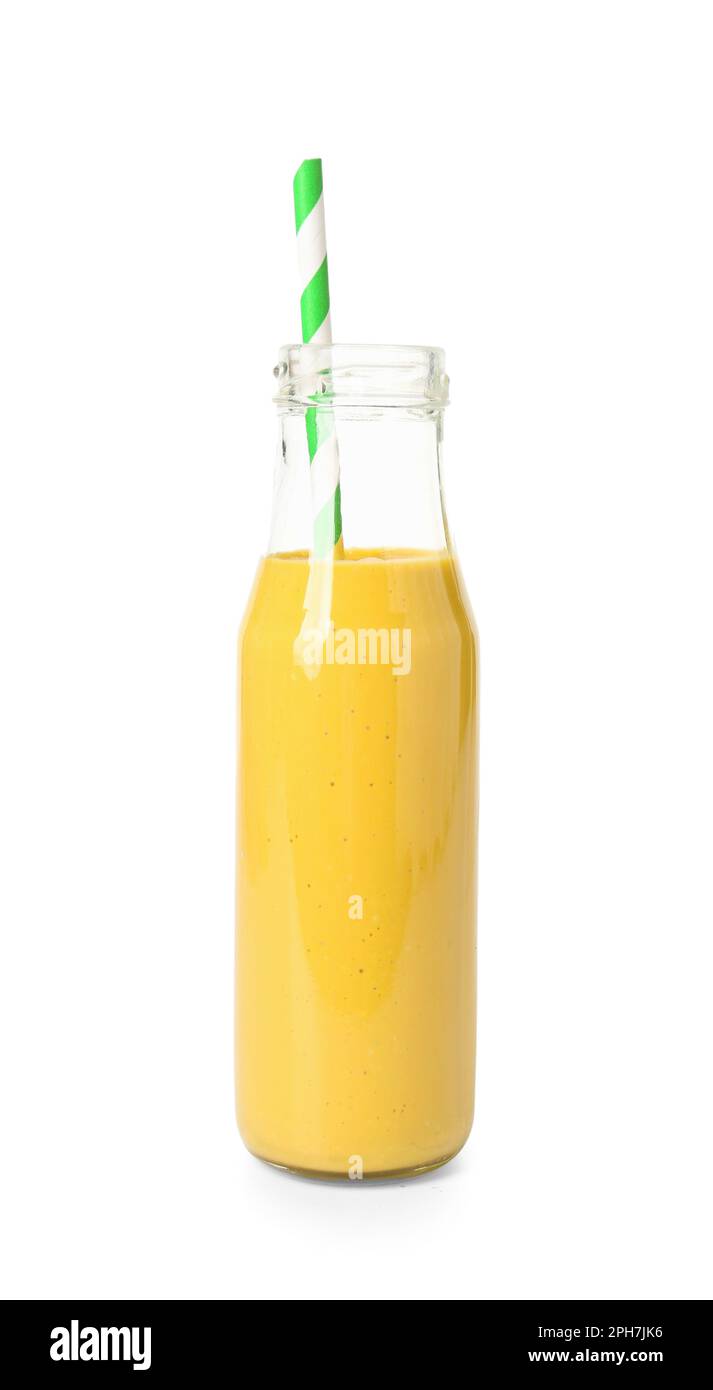 Glass bottle of tasty yellow smoothie with straw on white background ...