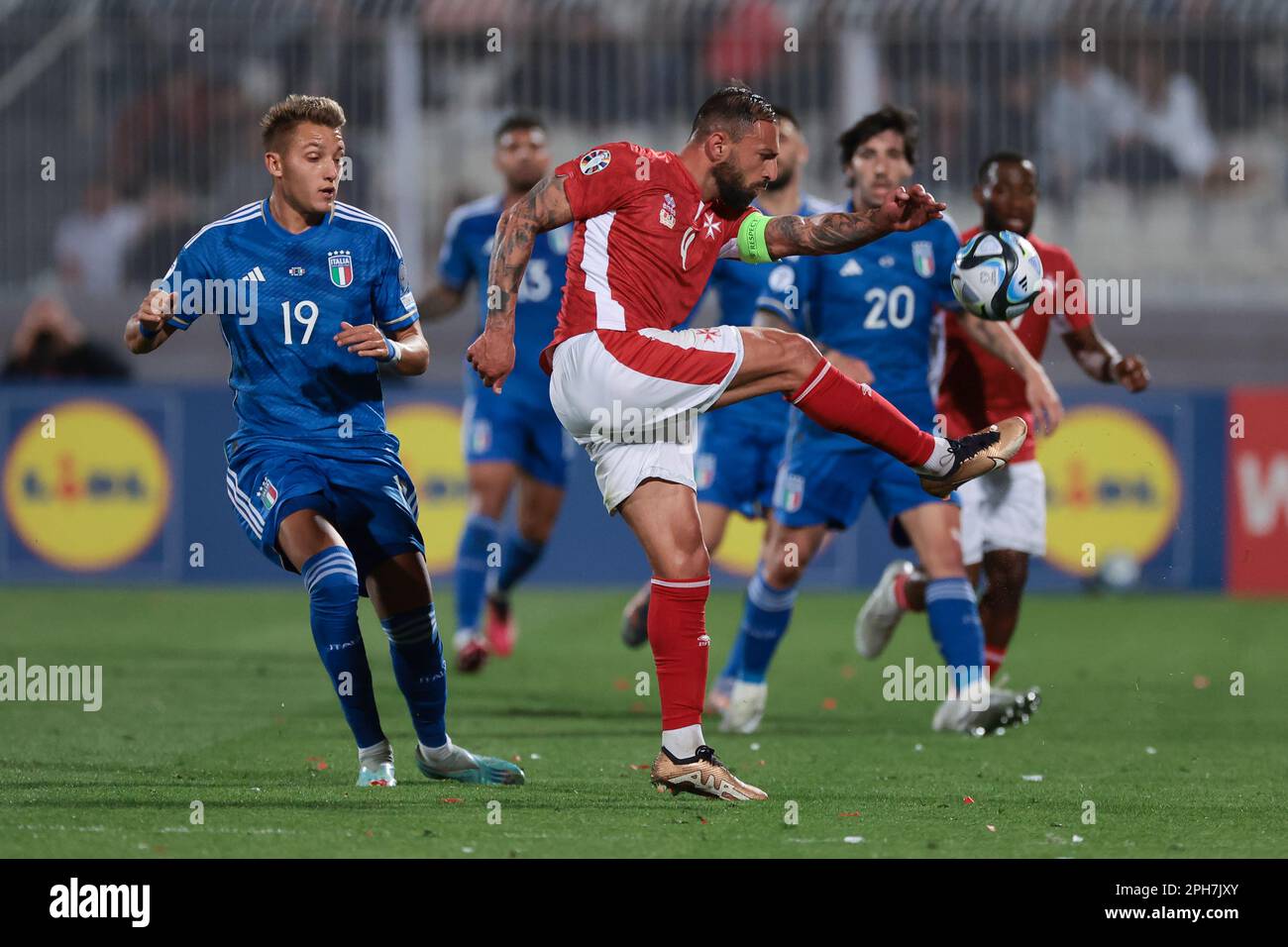 Attard, Malta, 26th March 2023. Steve Borg of Malta clears the ball as ...