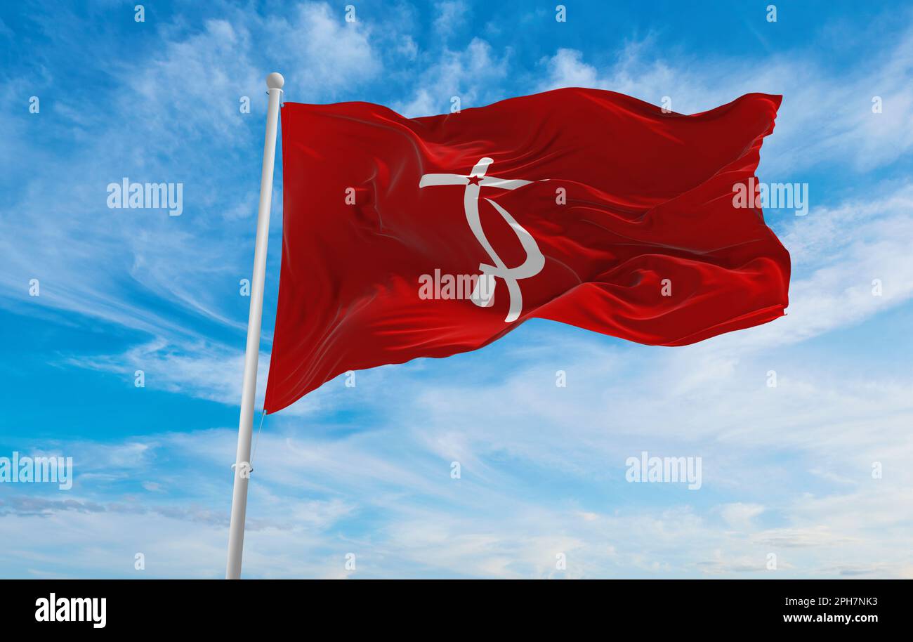 flag of Christian Communist symbol waving in wind at cloudy sky. love ...