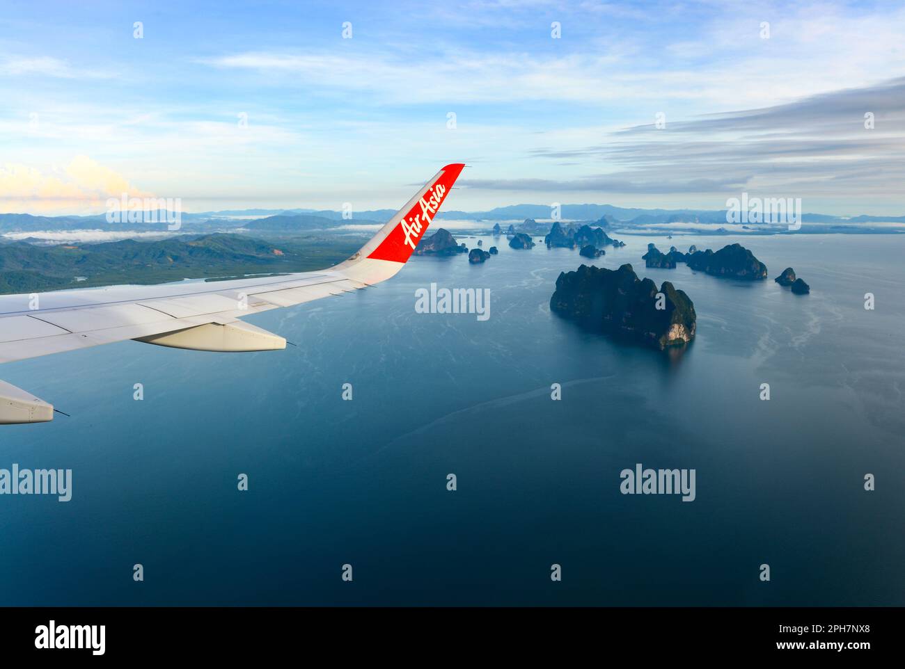 Phuket, Thailand - November 8, 2022: A wing of plane in the sky ...