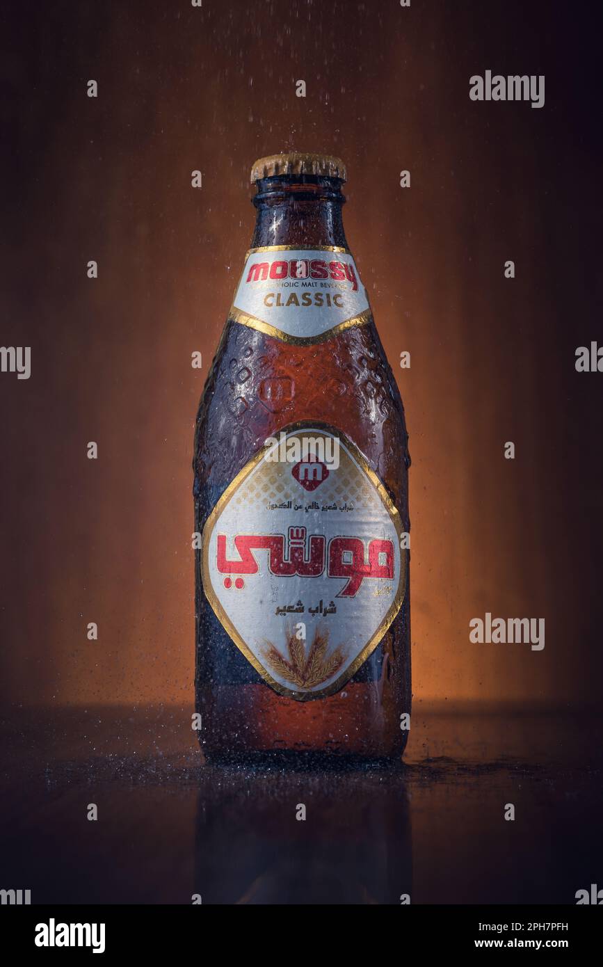 cold mousse malt drink bottle with condensed water drops and mist ...