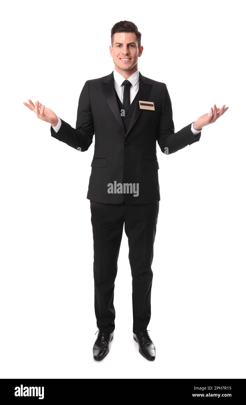 Full length portrait of happy receptionist in uniform on white ...