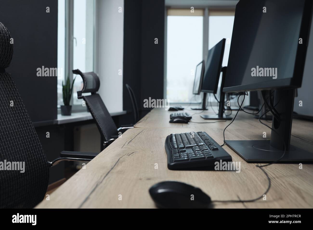 Rows of computers in empty office hi-res stock photography and images ...