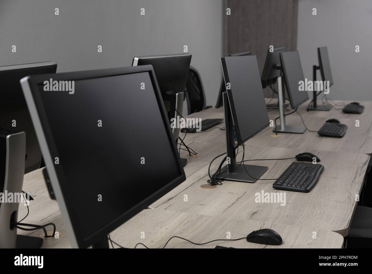 Many modern computers in open space office Stock Photo - Alamy