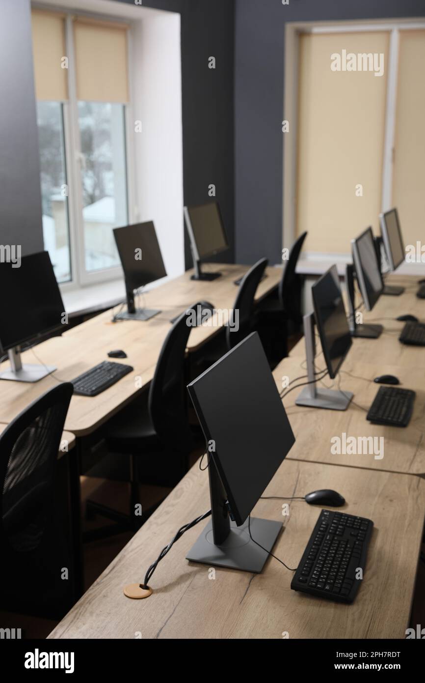 Rows of computers in empty office hi-res stock photography and images ...
