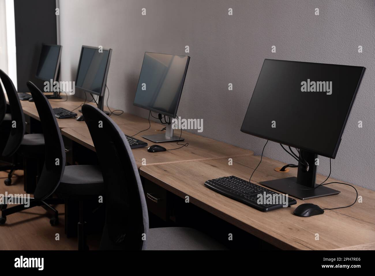 Many modern computers in open space office Stock Photo - Alamy