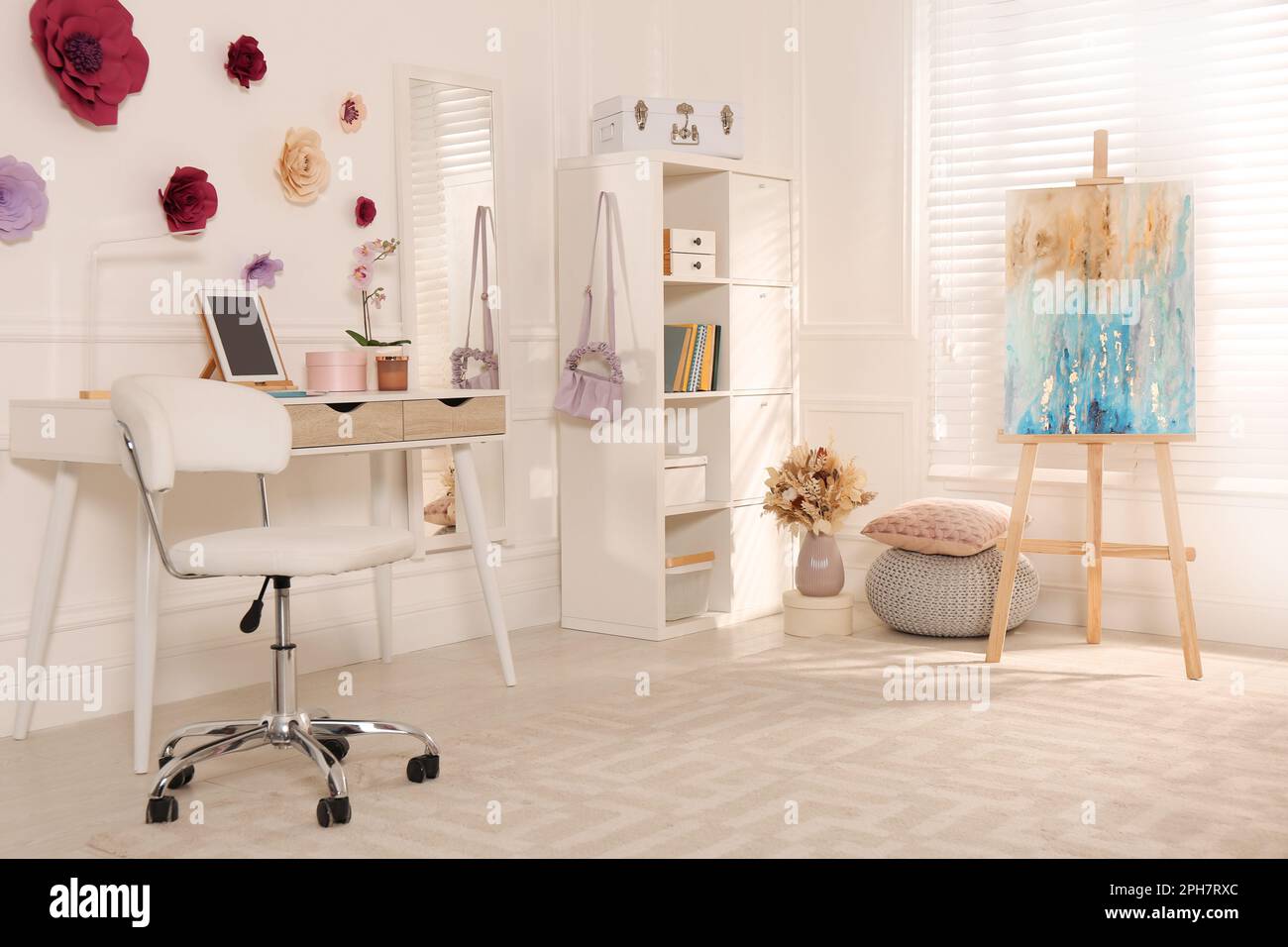 Stylish teenager's room interior with computer and painting easel Stock ...