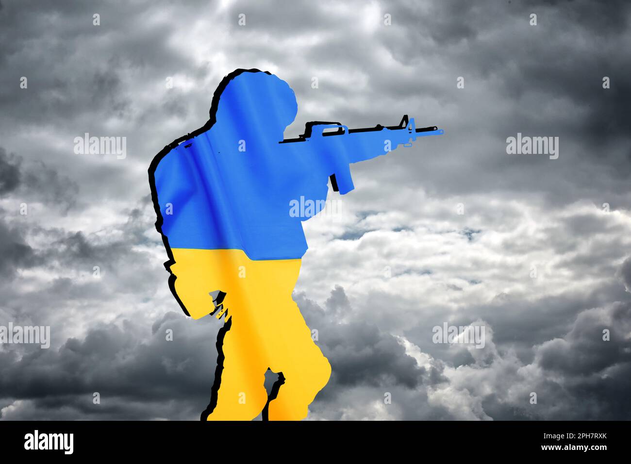 Silhouette of soldier in color of Ukrainian flag with assault rifle ...