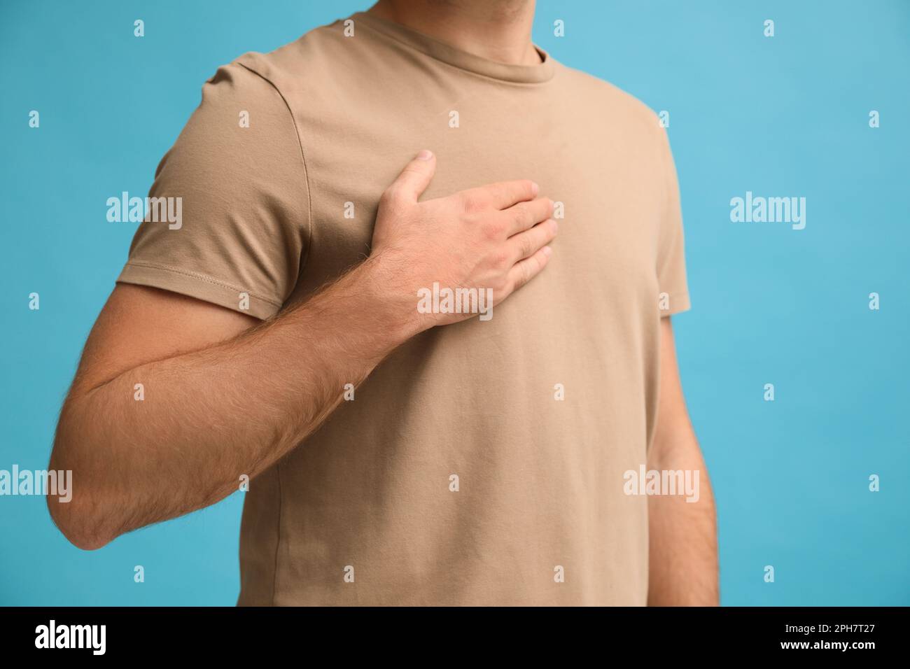 Hand near chest hi-res stock photography and images - Alamy