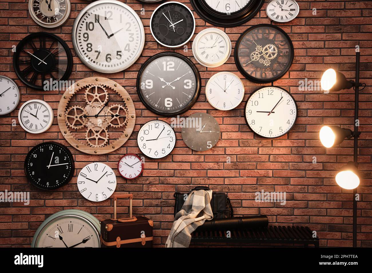Clock hanging on brick wall hi-res stock photography and images - Alamy
