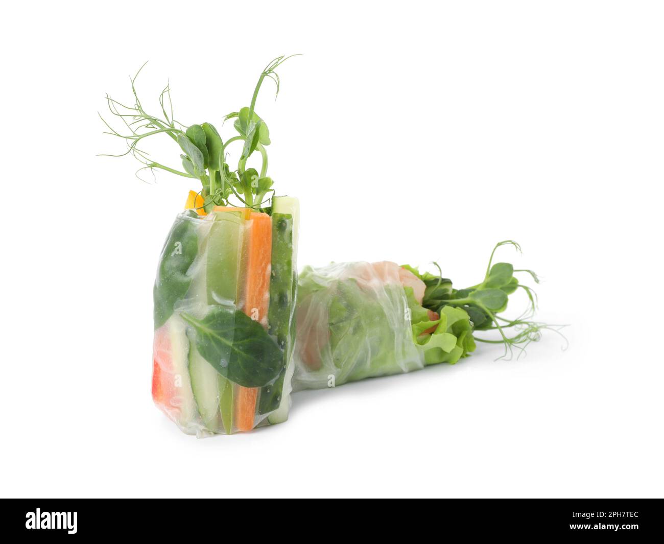 Delicious rolls wrapped in rice paper isolated on white Stock Photo - Alamy