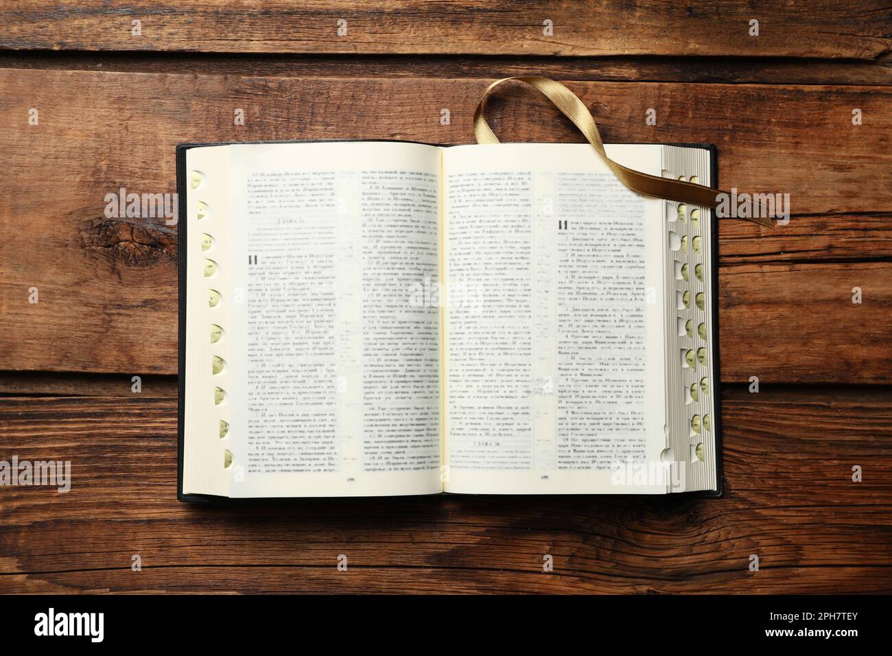 Open Bible on wooden table, top view. Christian religious book Stock ...