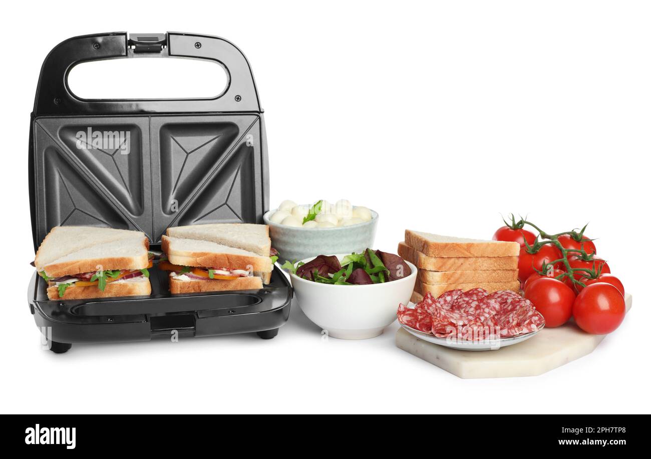 Modern grill maker with sandwiches and different products on white ...