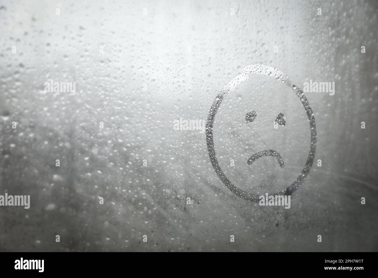 Sad face drawn on foggy window, space for text. Rainy weather Stock ...
