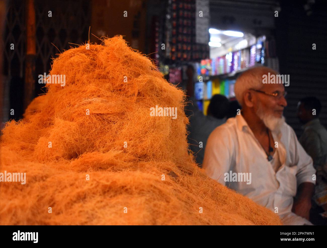 Kolkata, India. 26th Mar, 2023. A person is selling shemai (a ...
