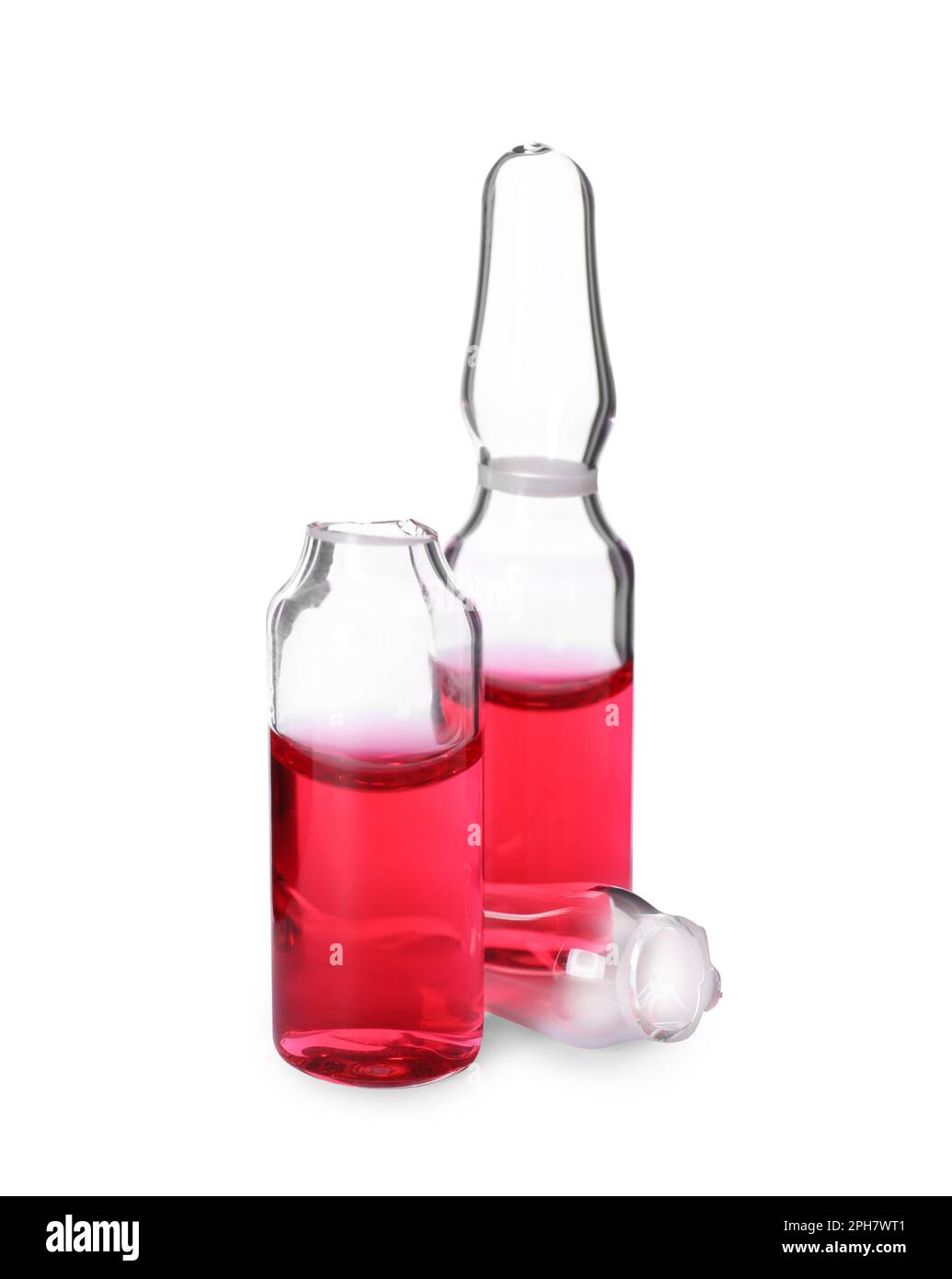 Open and closed glass ampoules with pharmaceutical product on white ...