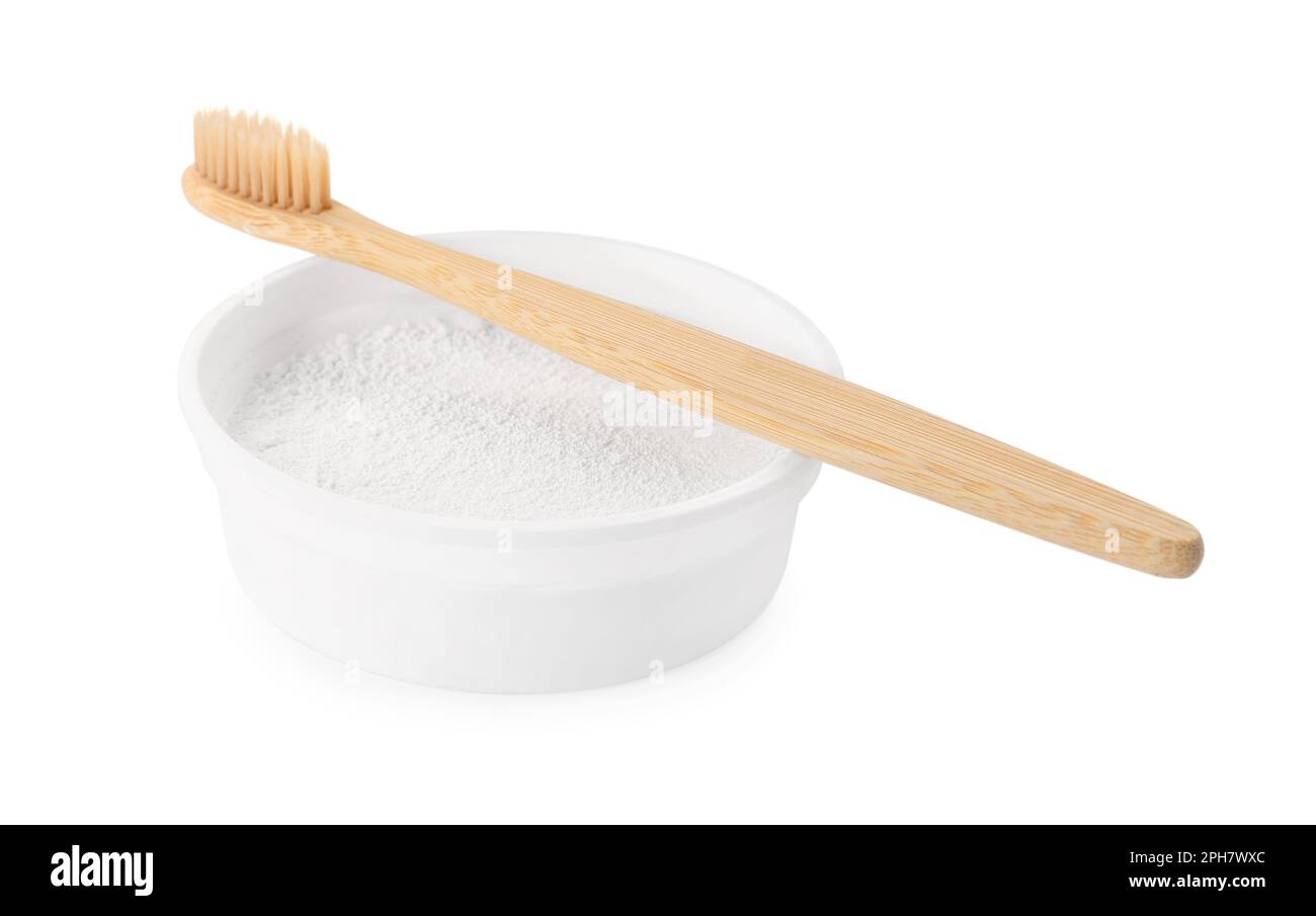 Bowl of tooth powder and brush on white background Stock Photo - Alamy