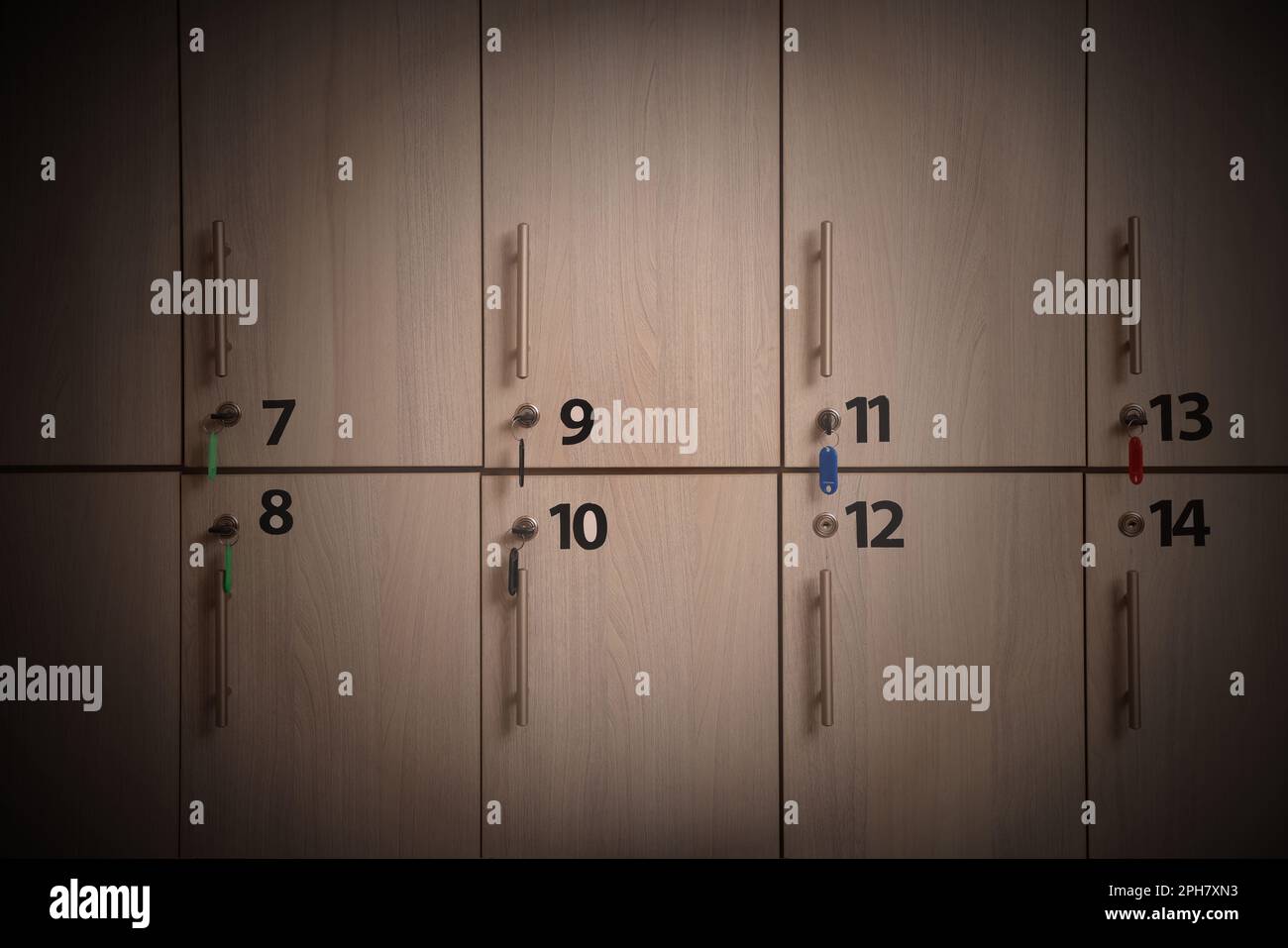 Many wooden lockers with keys and numbers on doors. Vignette effect ...