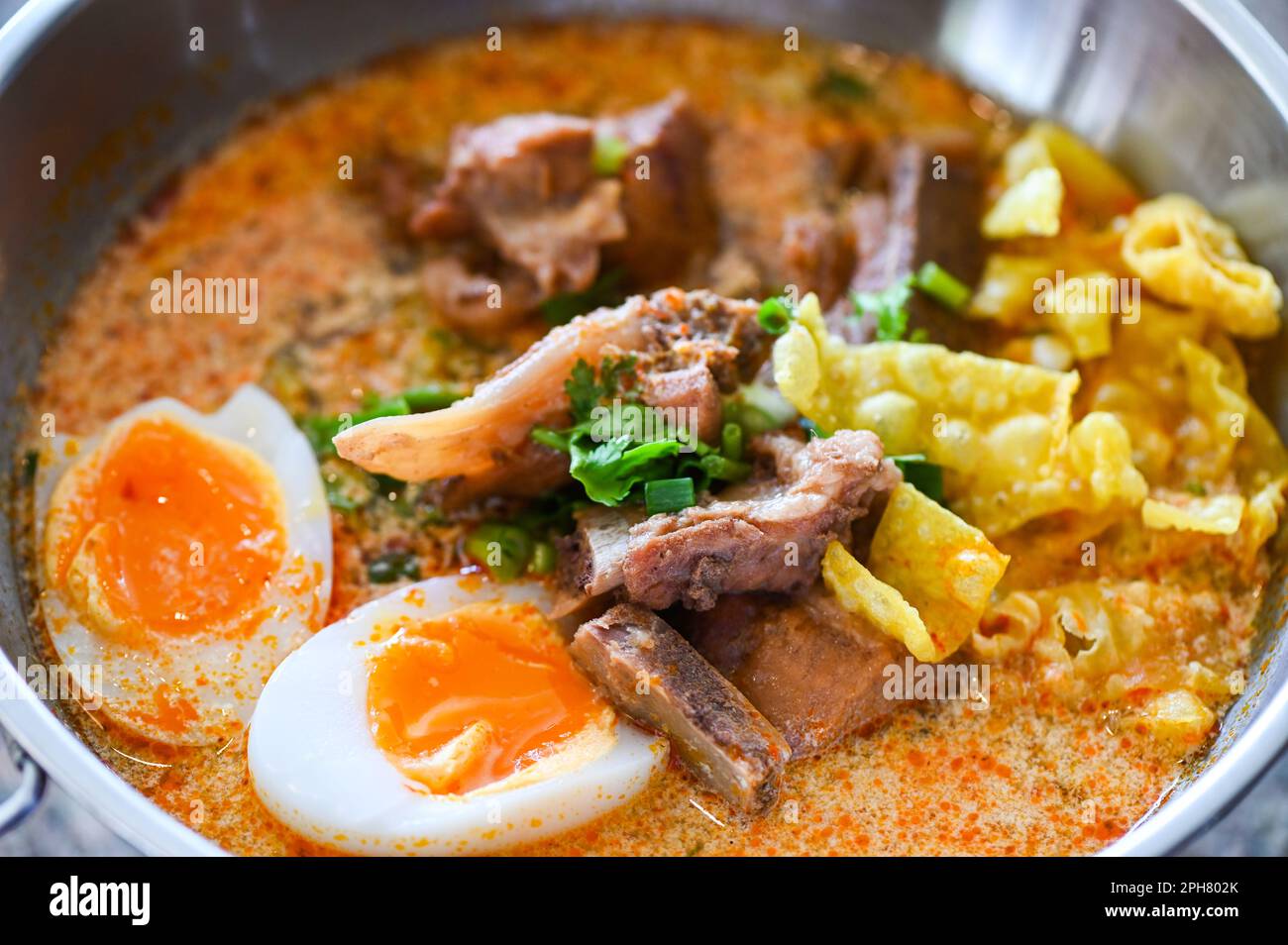 curry bone soup - bone soup pork with boiled eggs in hot pot, Thai food ...