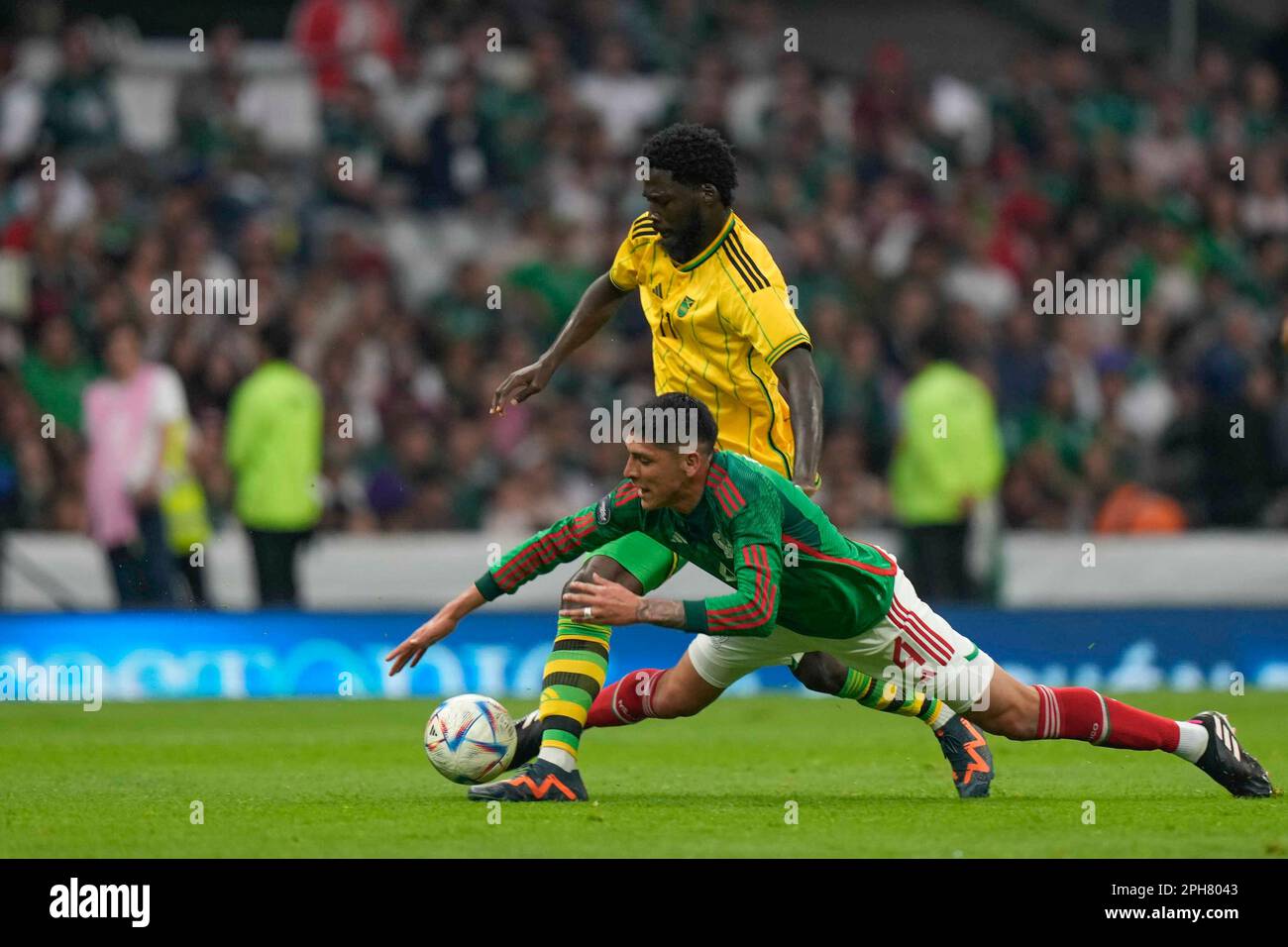 Jamaica's Shamar Nicholson, top, and Mexico's Edson Alvarez fight for ...
