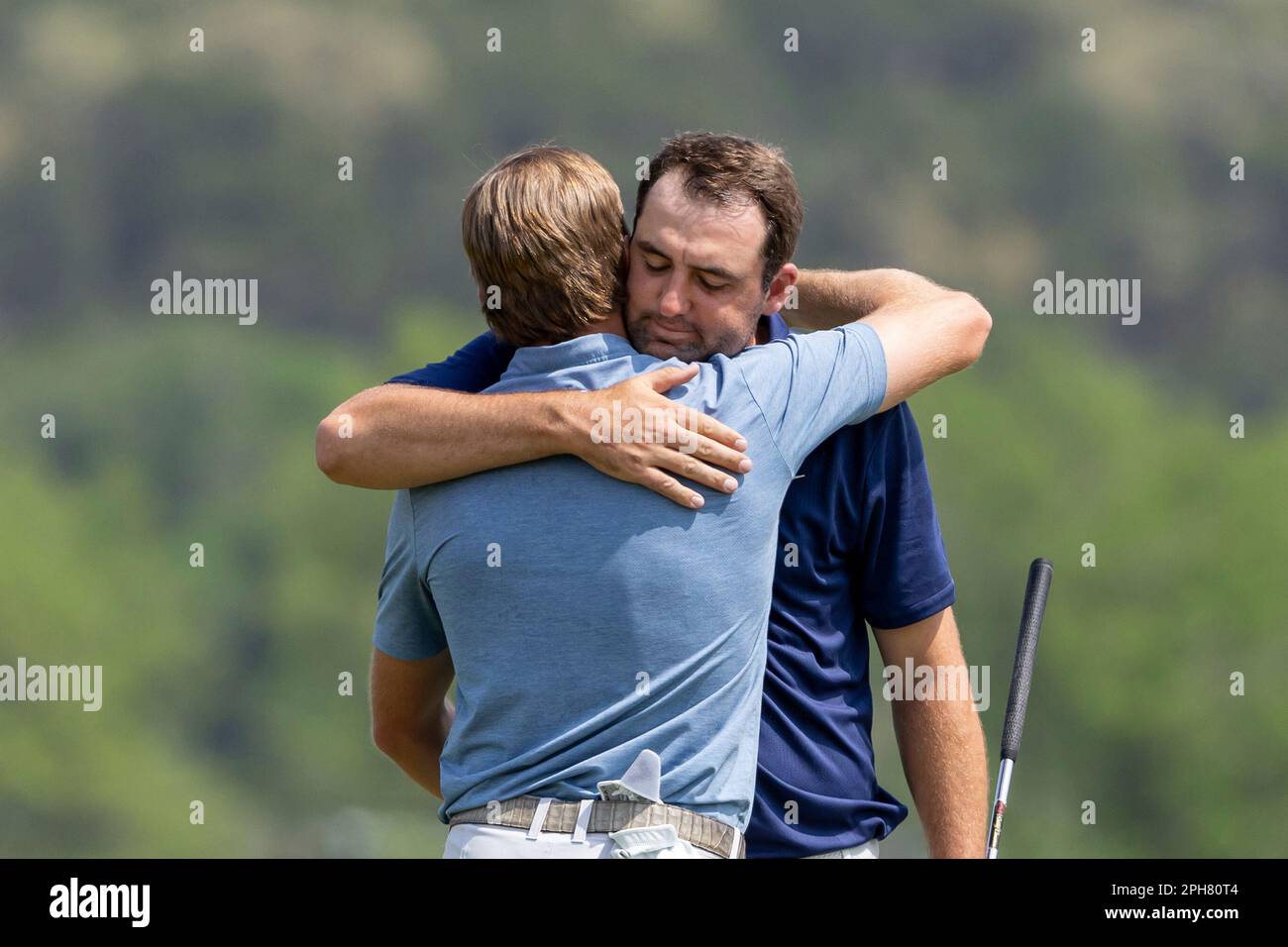 AUSTIN, TX - MARCH 26: Scottie Scheffler and Sam Burns hug after their ...