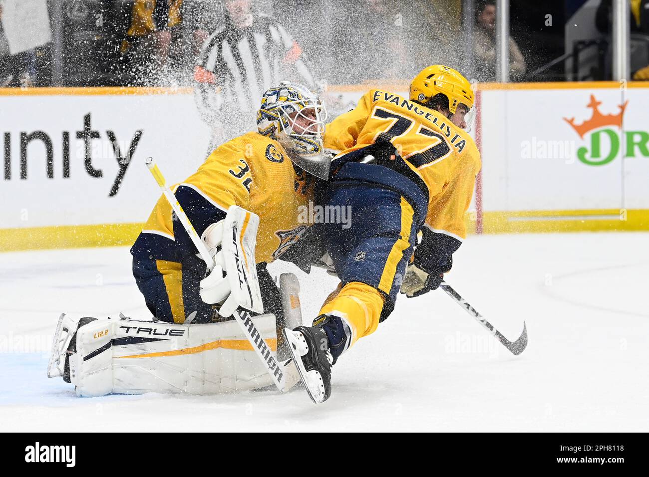 Nashville Predators right wing Luke Evangelista (77) collides with ...