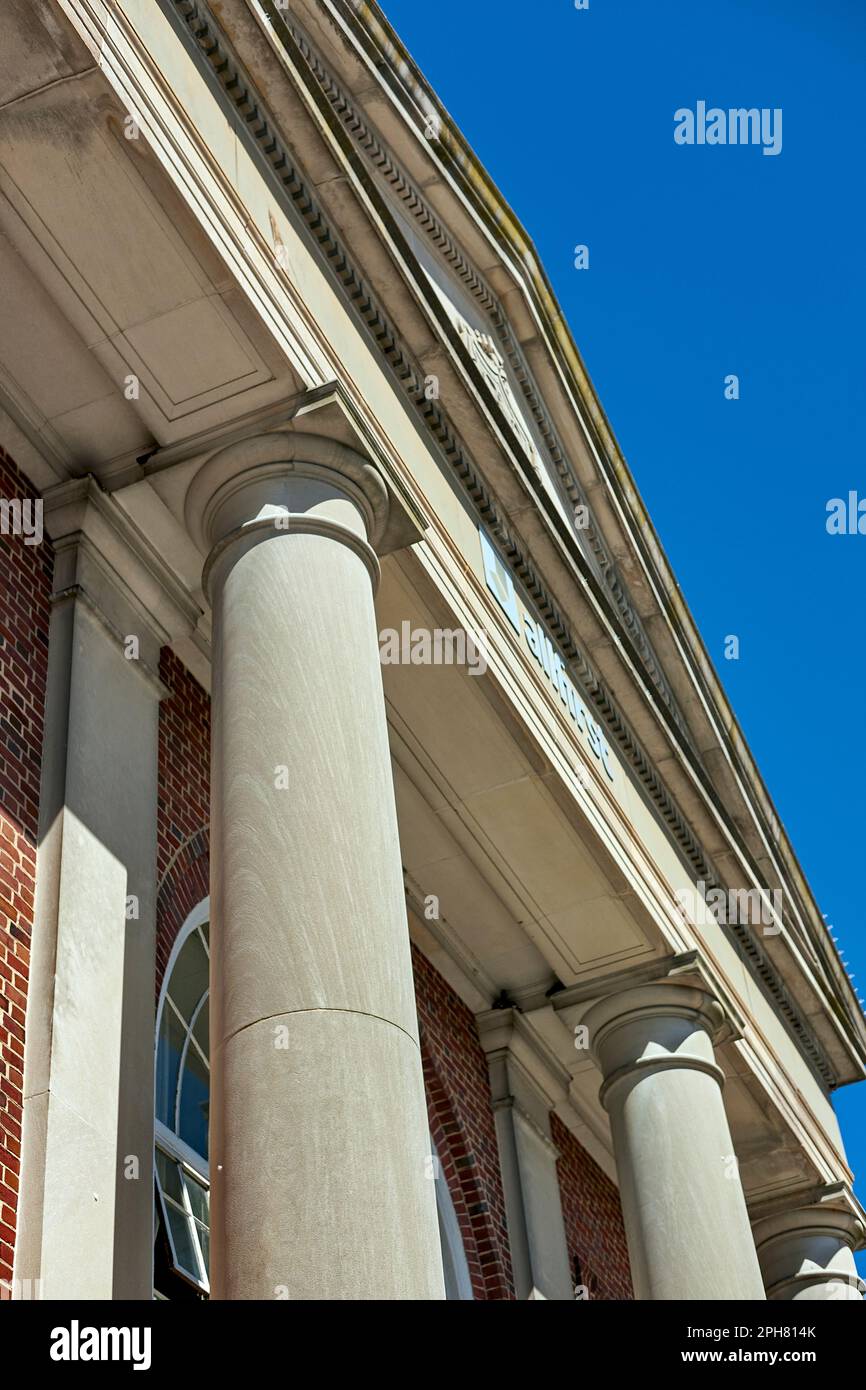 Looking upward at a neo-classical financial building facade in downtown ...