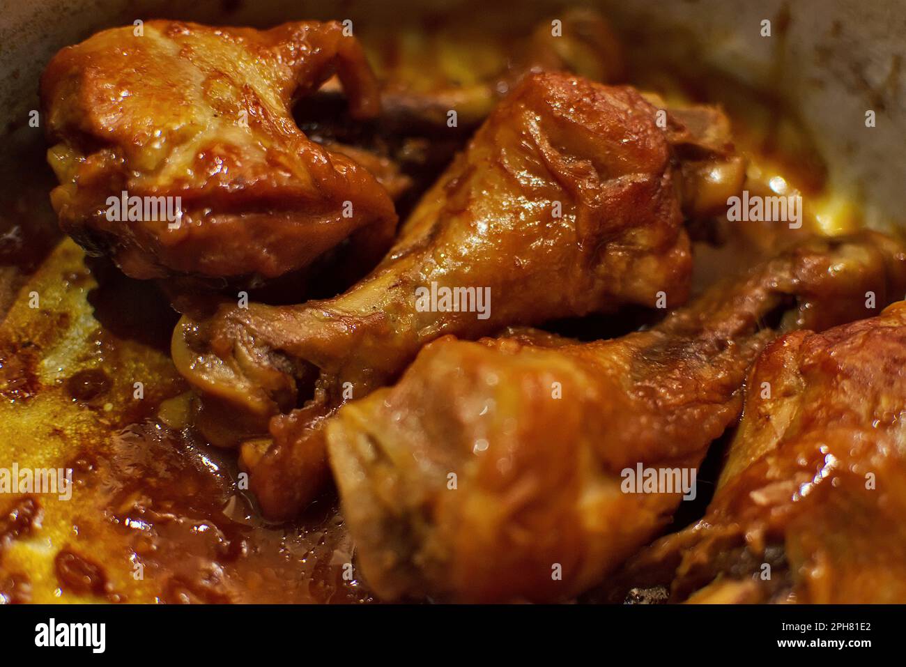 Chicken cooked inside the pan Stock Photo - Alamy