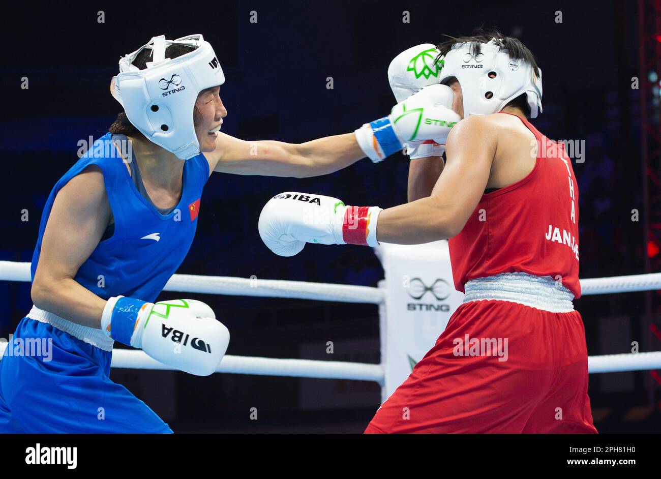New Delhi, India. 26th Mar, 2023. China's Yang Liu (L) competes with ...