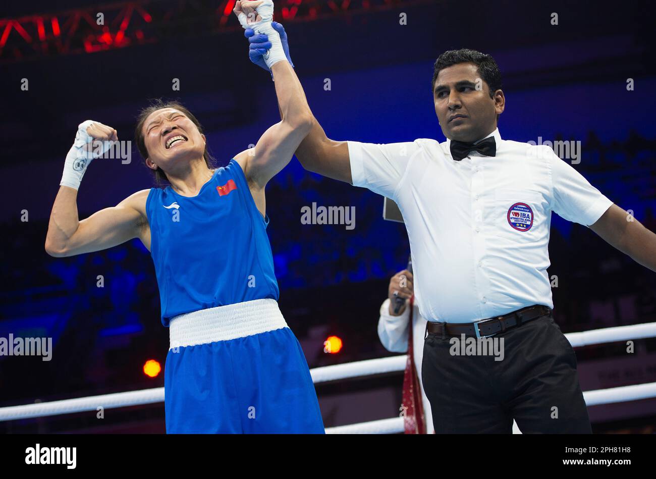 New Delhi, India. 26th Mar, 2023. China's Yang Liu (L) is declared the ...