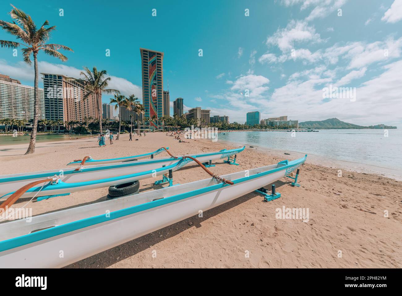 Waikiki beach landscape with racing canoe boats. Honolulu city, Oahu ...