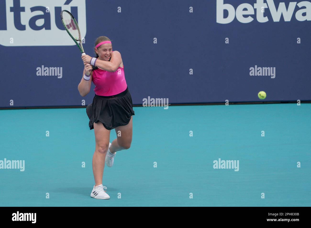 MIAMI GARDENS, FL - MARCH 25: Jelena Ostapenko (LAT) hits a shot during ...