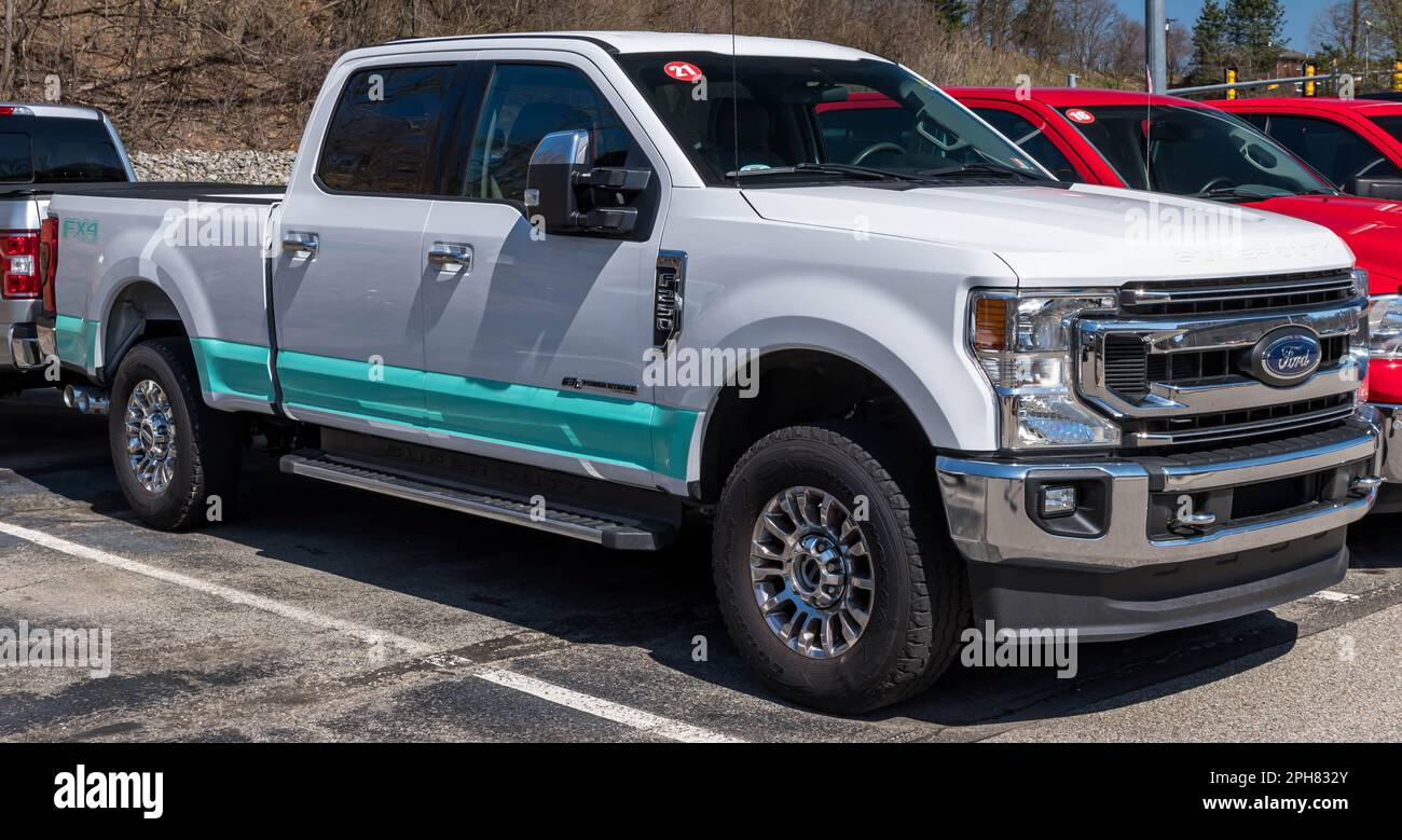 A two toned Ford F250 pickup truck for sale at a dealership in ...