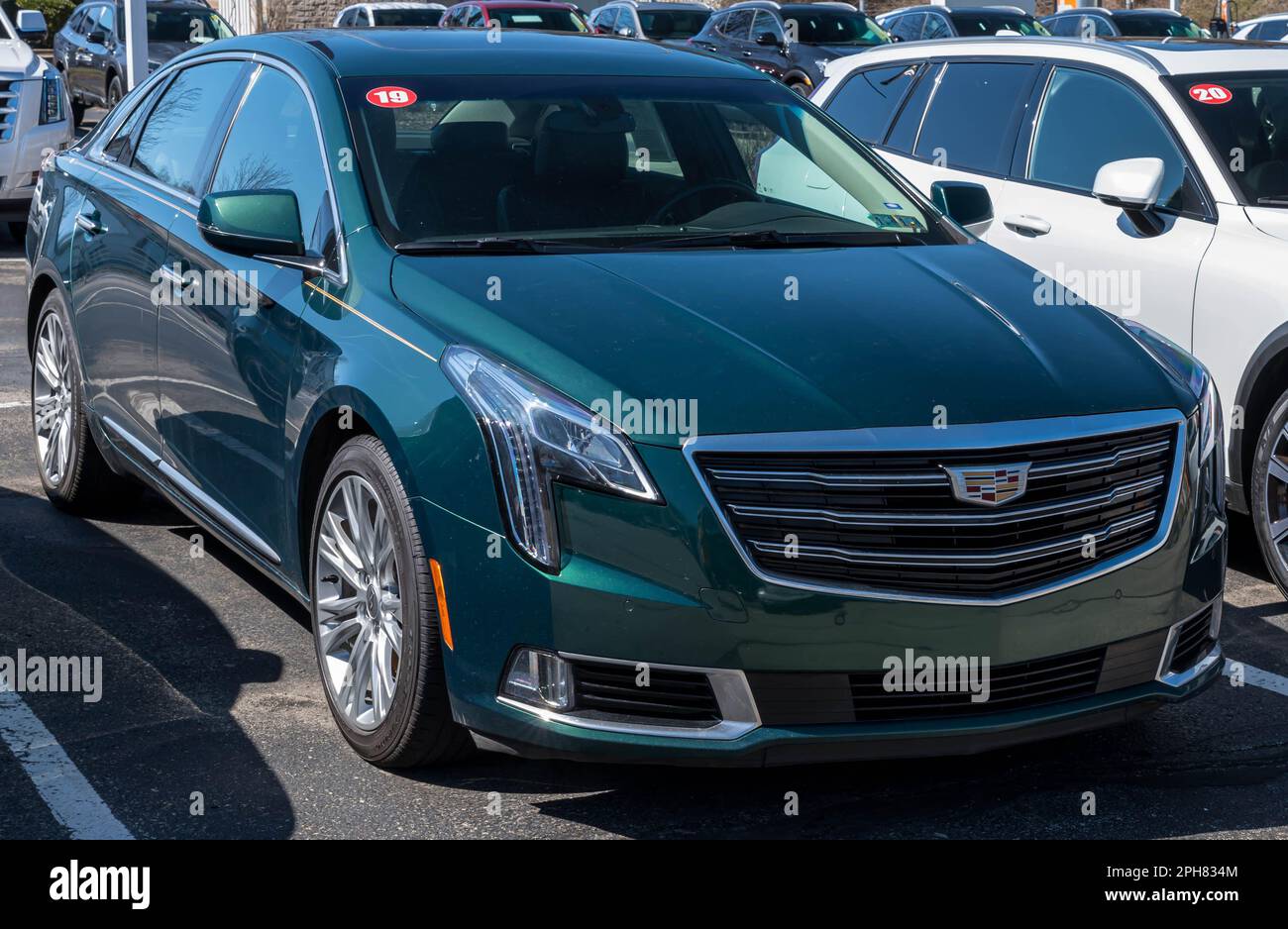 A used, green Cadillac sedan for sale at a dealership in Monroeville ...