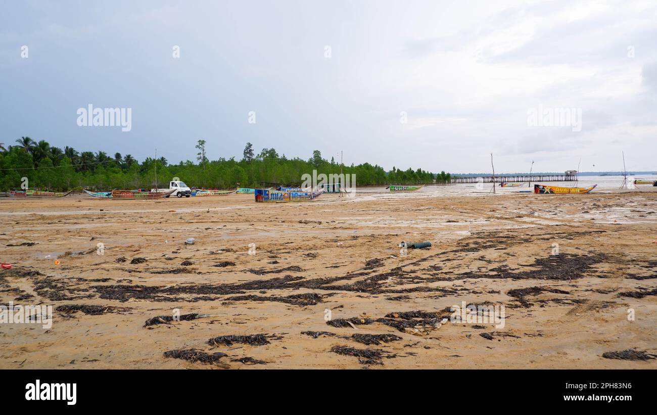 View Of A Wide Sand Beach With Several Boats And Mangroves, At Belo ...