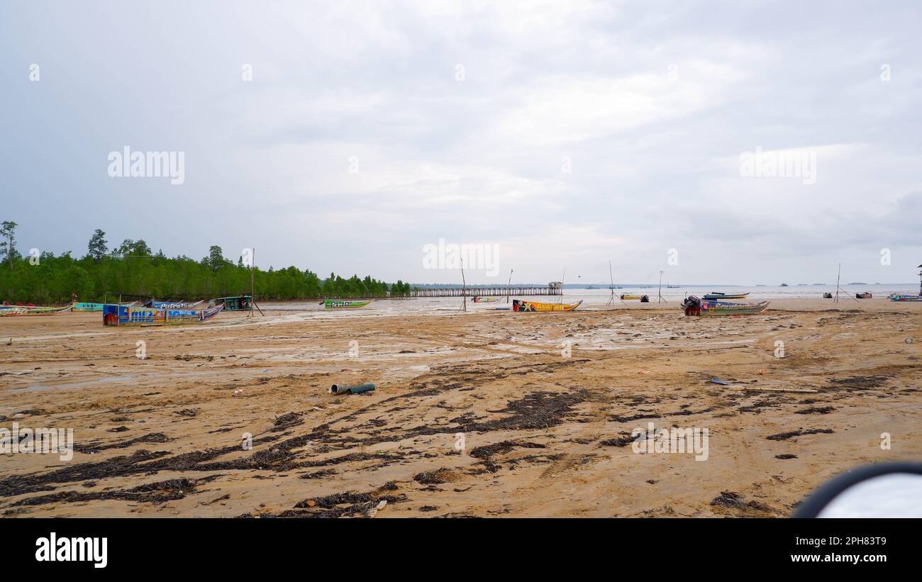 A Wide Sand Beach With Several Boats And Mangroves, In The Village Of ...