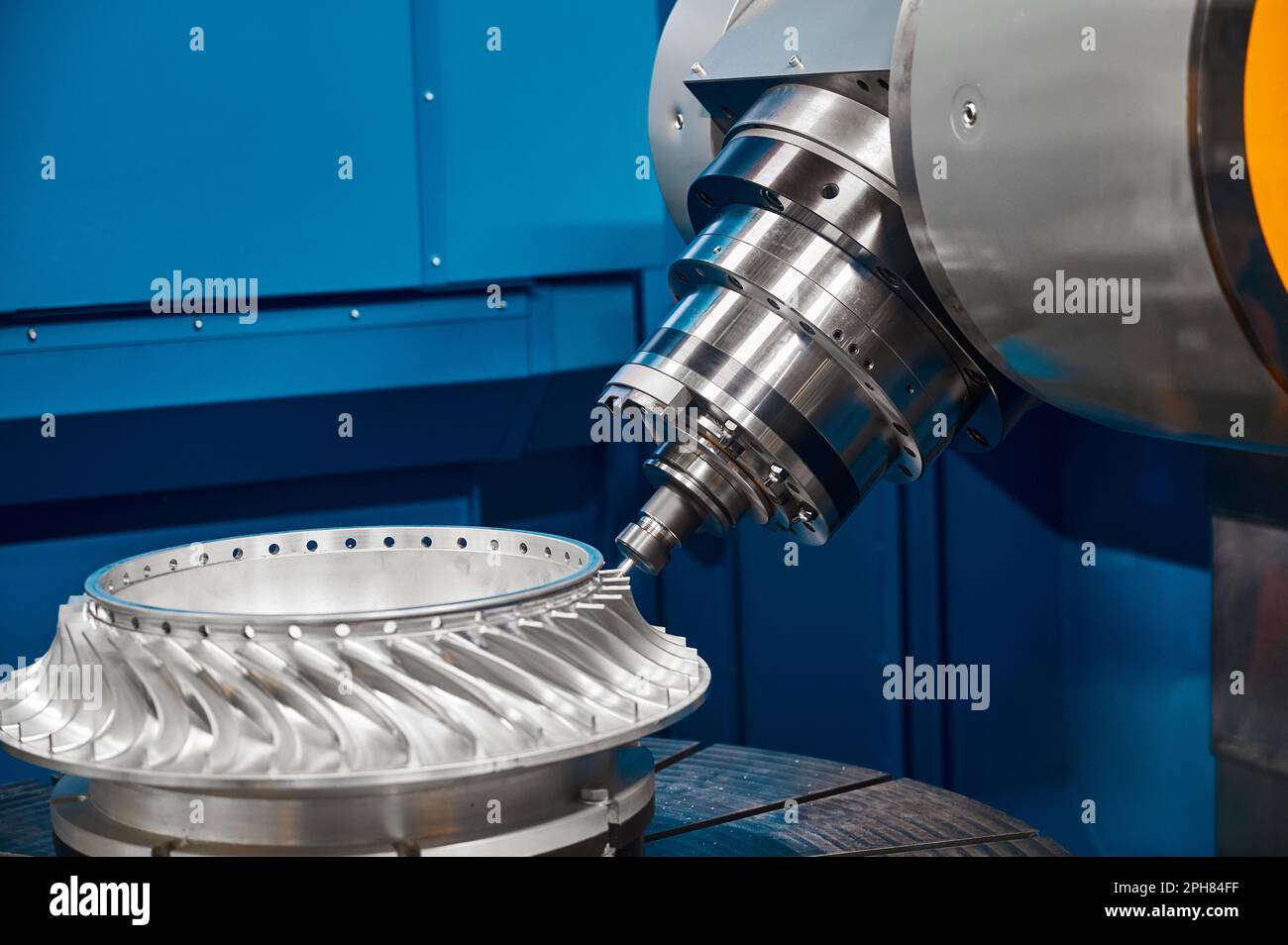 Producing turbine wheel part with five-axis lathe machine Stock Photo ...