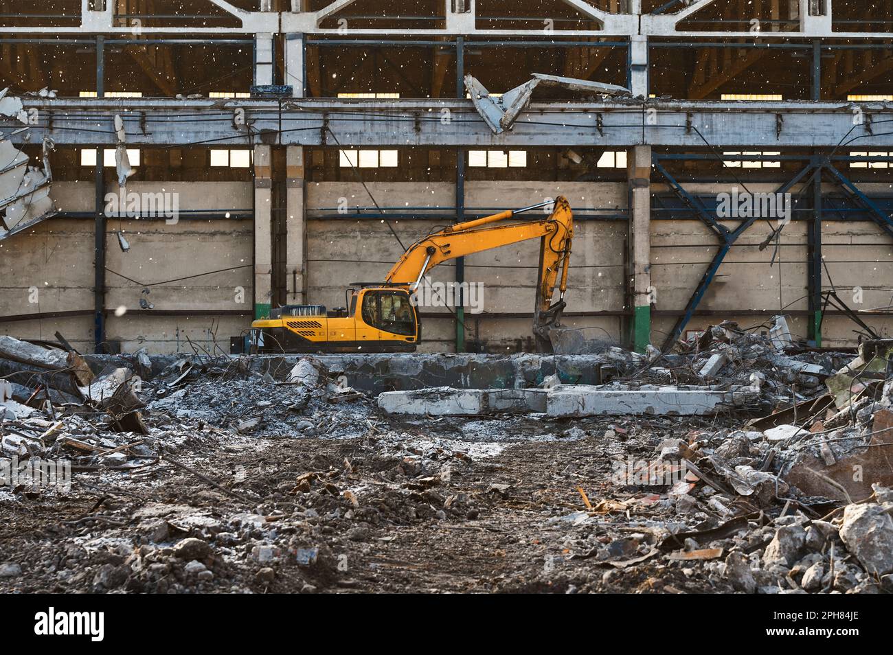 Hydraulic excavator works with debris at demolition site Stock Photo ...