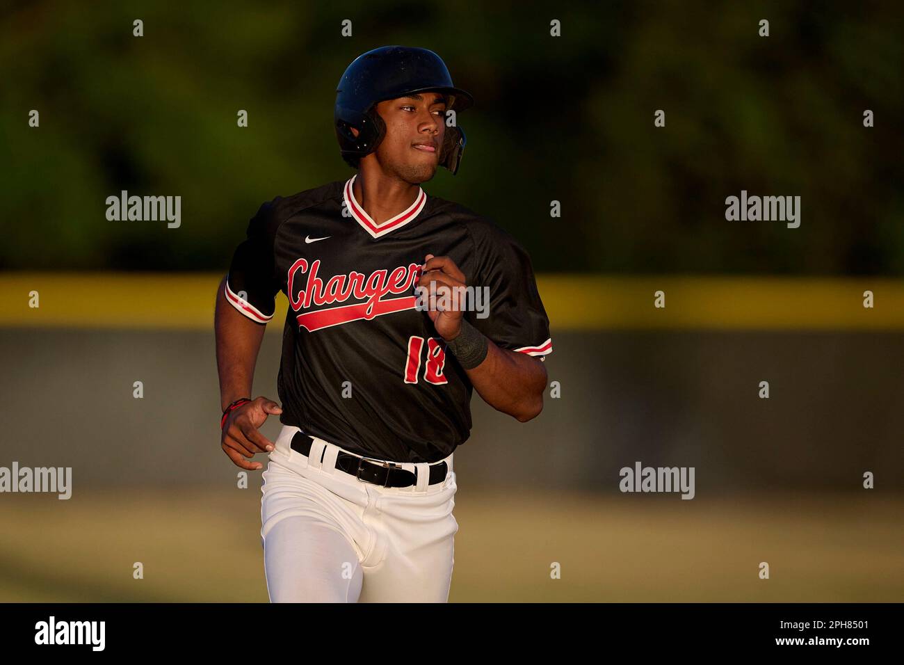 Strawberry Crest Chargers Arjun Nimmala (18) running the bases during a ...