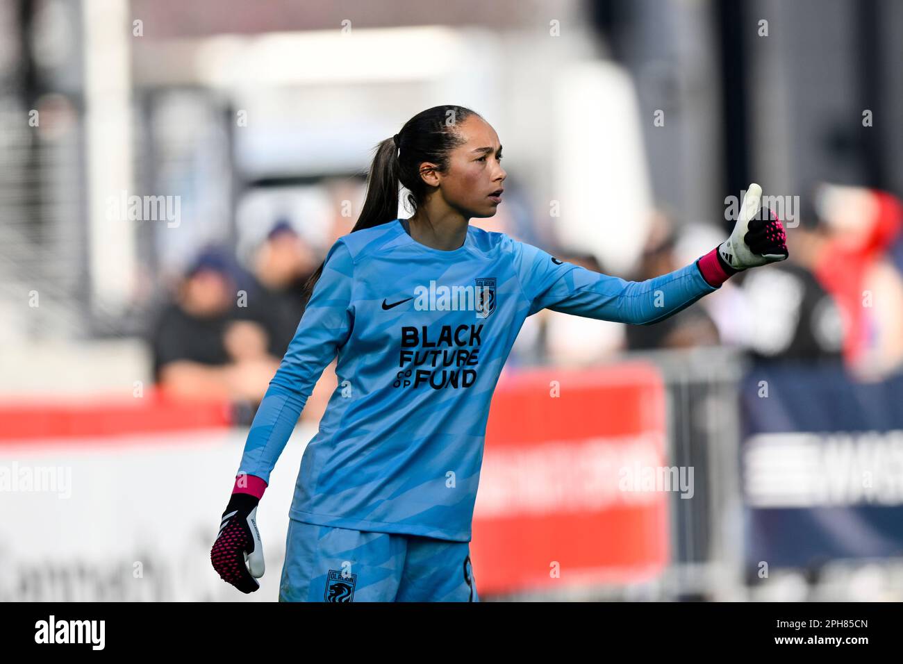 OL Reign goalkeeper Phallon Tullis-Joyce gestures during the first half ...