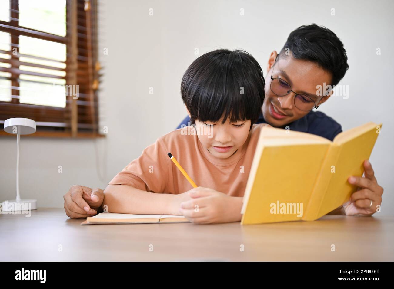 Asian parents teaching their baby hi-res stock photography and images ...