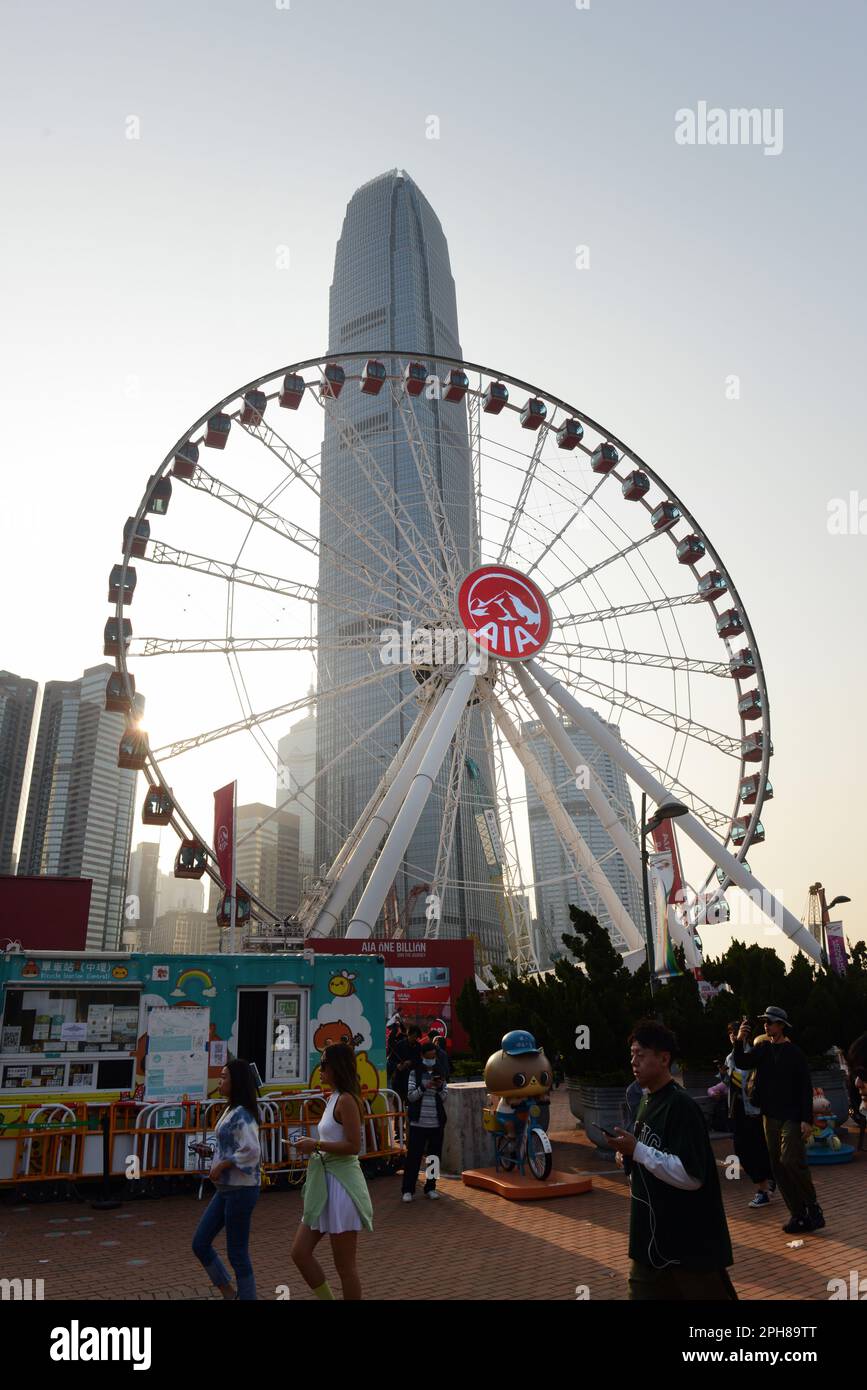 The AIA Ferris wheel with the IFC tower behind it. Central District ...