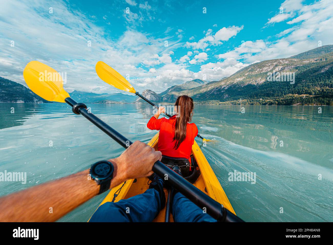 People kayaking paddling in kayak amazing nature landscape in Squamish ...