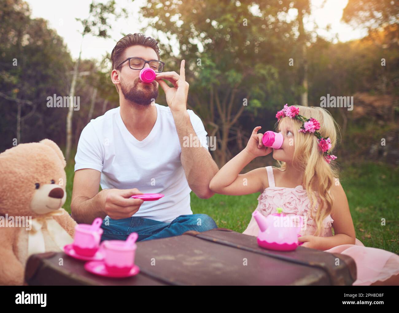 Were enjoying ourselves today. a cheerful daughter and father having a ...