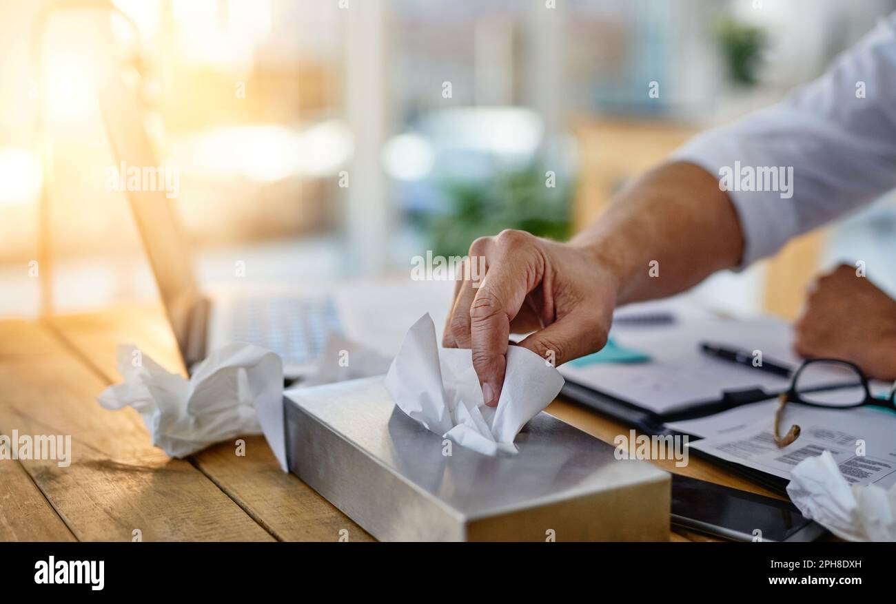 Tissue after tissue and this flu wont go. an unrecognizable man taking ...