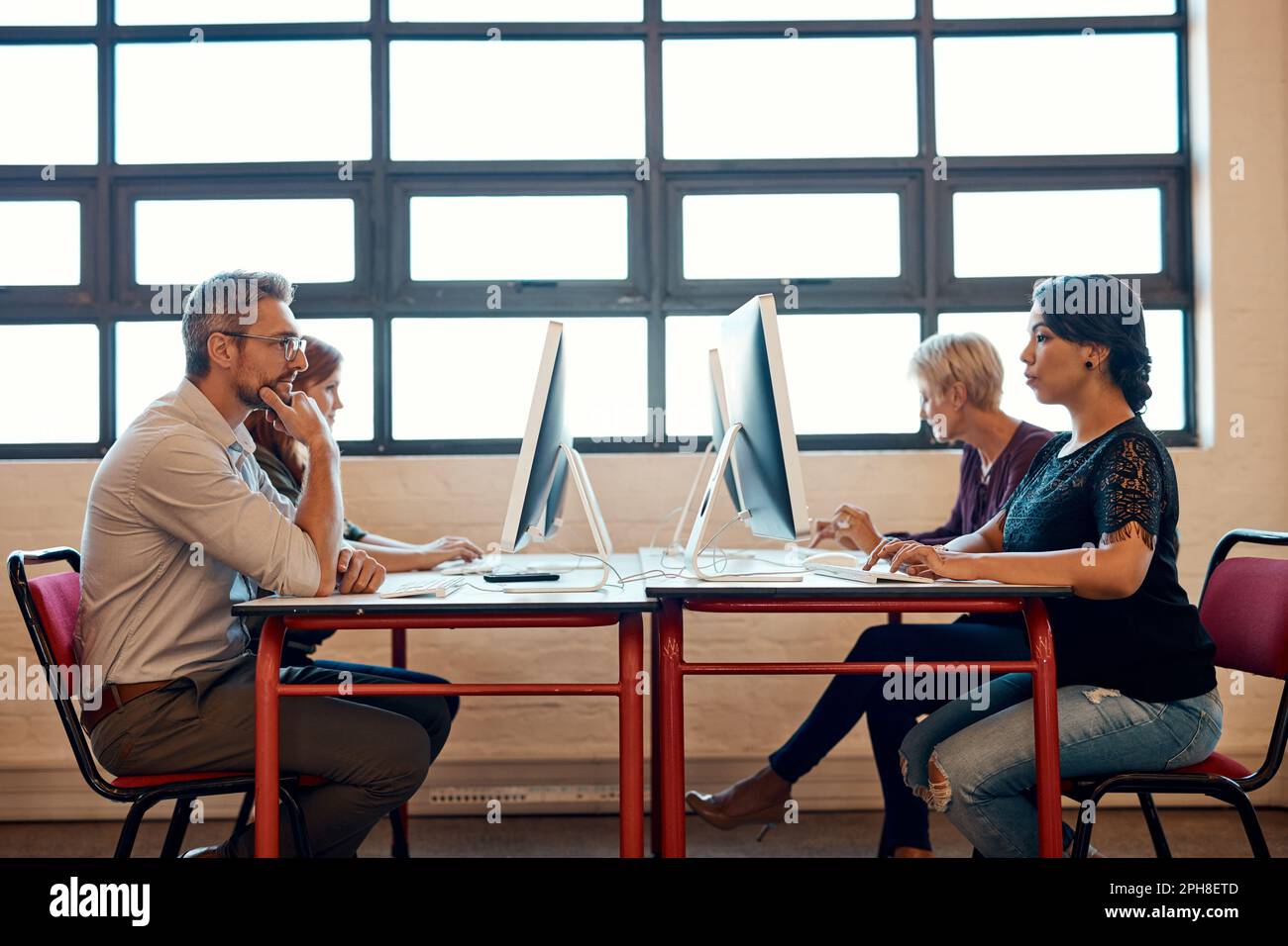 The connected team is a productive team. a group of businesspeople ...