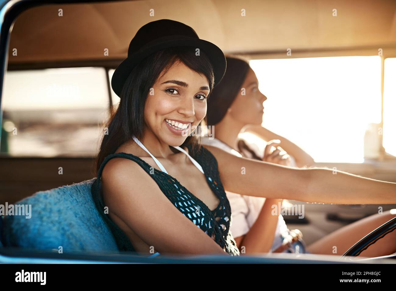 Lets go somewhere beautiful. Portrait of a happy young woman enjoying a ...