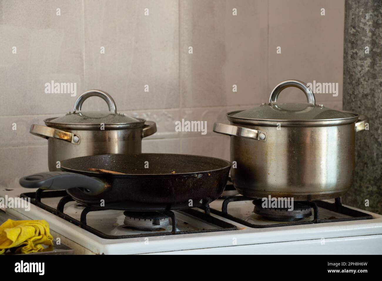 pots are on the gas stove in the kitchen at home, cook on the stove ...