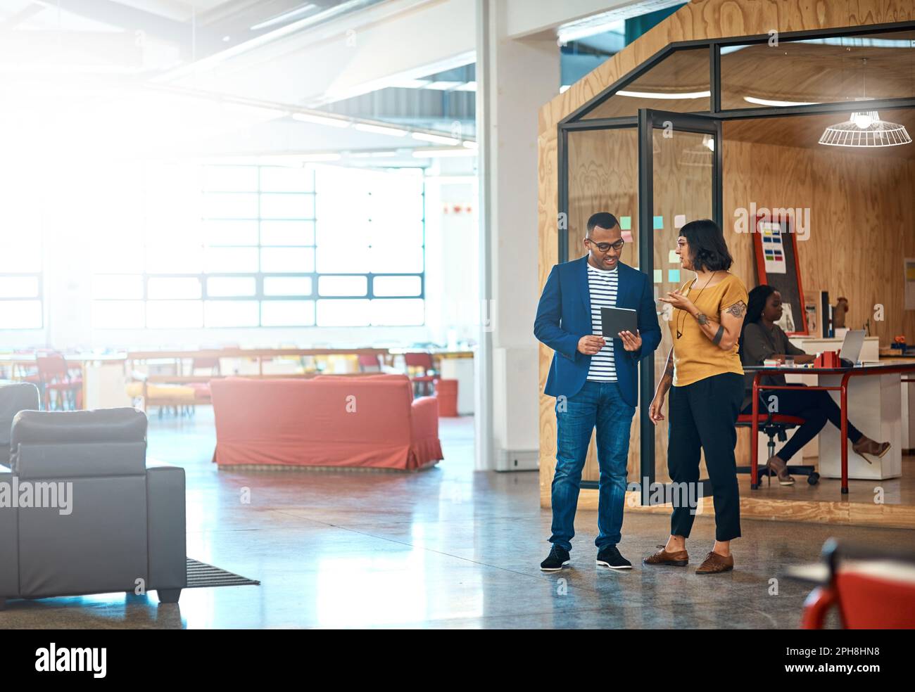 Visualising success together. two young designers working together on a ...