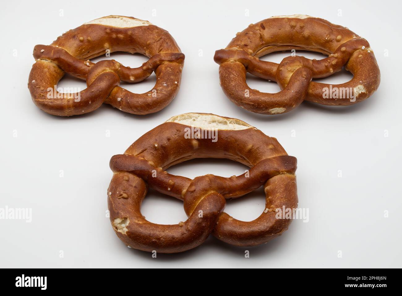 Brezel, also known as a pretzel, is a type of baked bread product often ...